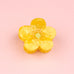 Mini pince à cheveux bouton d'or : un jaune brillant pour toutes les ...